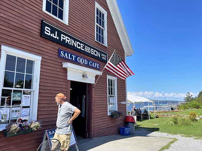 The outdoor setup captures everything right about summer in Maine: sunshine, sea breeze, and seriously good food within arm's reach.