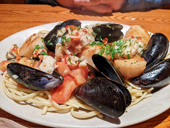 A symphony of seafood – mussels, scallops and lobster dance with pasta in a garlic-wine sauce that captures the essence of coastal Maine.