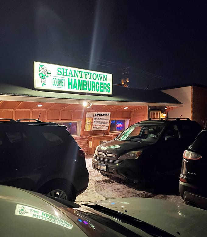 Even at night, the glowing sign beckons hungry travelers like a beacon of hope for those seeking burger excellence.