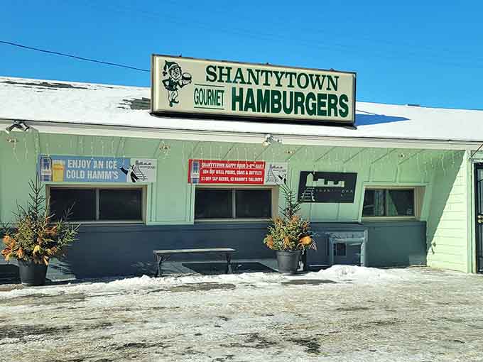 The exterior welcomes you year-round, whether under summer sun or winter snow, promising warmth and good food inside.