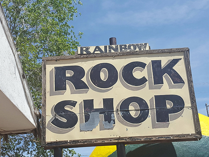 The weathered sign promises rocks but delivers time travel &ndash; Rainbow Rock Shop's entrance is a portal to Earth's most dazzling history.