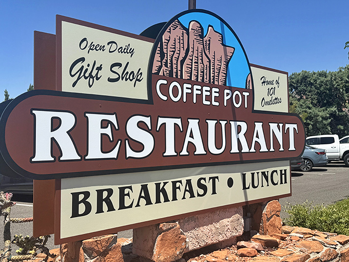 The beacon that draws hungry travelers &ndash; Coffee Pot's iconic sign promises breakfast bliss against Sedona's brilliant blue sky.