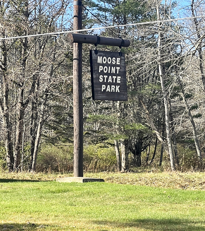 The unassuming entrance sign exemplifies Moose Point's understated charm &ndash; a place that doesn't need to shout about its considerable beauty.