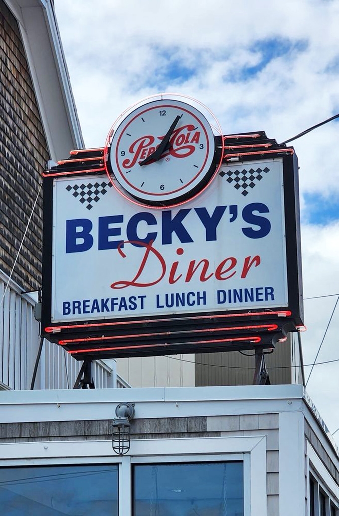 Landmark status: Becky's iconic neon sign with vintage Pepsi clock stands as Portland's culinary lighthouse, guiding hungry souls to breakfast nirvana.