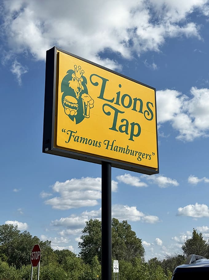 That iconic yellow sign standing tall against blue skies, beckoning burger lovers from across the Twin Cities to come and experience perfection.
