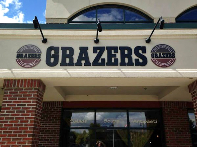 Welcome to Grazers, where the classic brick exterior and modern signage hint at the perfect blend of traditional and contemporary within.