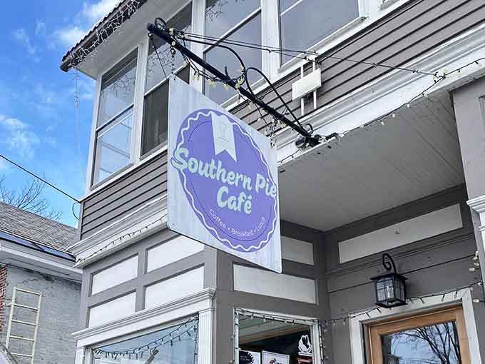 That cheerful purple sign hanging proudly announces you've found the spot where breakfast sandwiches and pies reign supreme.