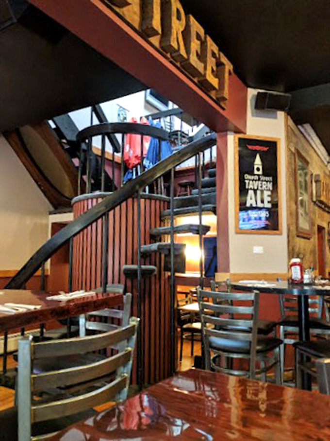 A spiral staircase that adds architectural intrigue to your dining adventure&mdash;leading to more good times above.