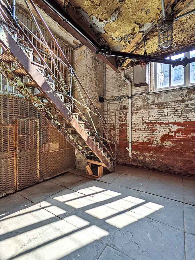 Steel Staircase: Industrial elegance in rust and decay, these stairs connected the tiers of cells like the spine of some massive mechanical beast.