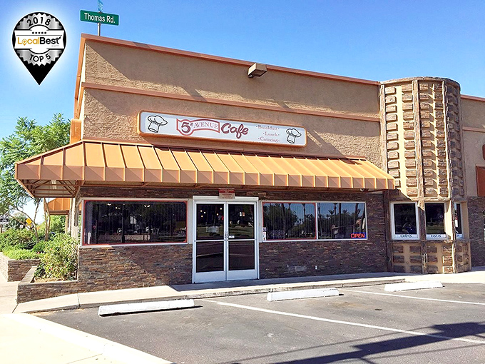 Storefront: The full exterior view reveals 5th Avenue Cafe's perfect positioning &ndash; a breakfast oasis ready to welcome hungry morning explorers.