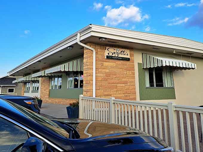 Morning light bathes the exterior in warm tones, inviting diners to step inside and experience culinary magic in rural Minnesota.