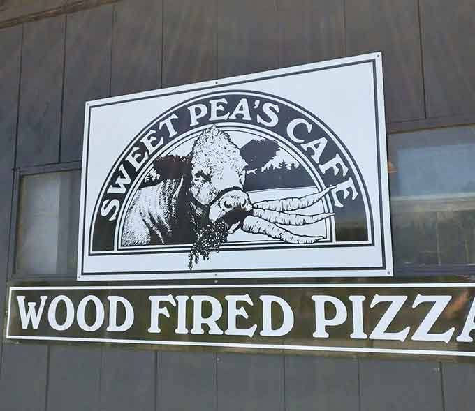 The Sweet Pea's signage promises wood-fired pizza, and unlike most promises in life, this one delivers spectacularly.