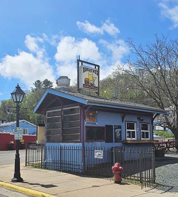 Romayne's little blue building has been serving up burgers and local flavor long enough to earn its place in town history.