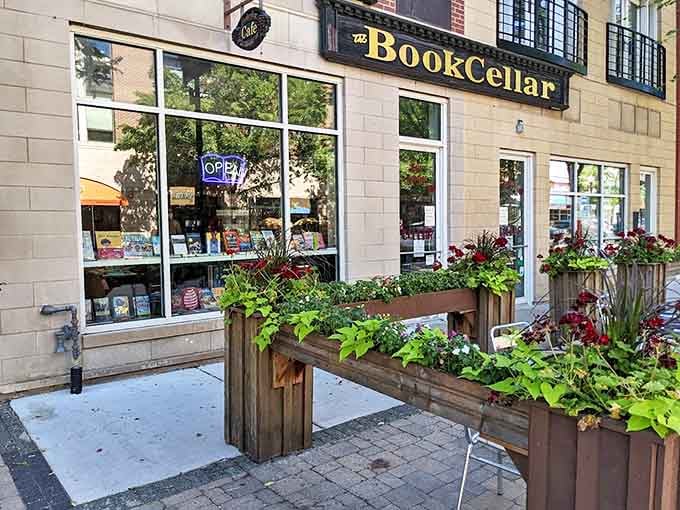In warmer months, planters burst with color outside The BookCellar, extending the store's warmth onto Lincoln Square's welcoming streets.