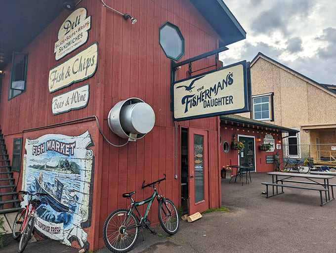 The red building against the harbor backdrop looks like it was placed there by someone who understood exactly what Minnesota needed.