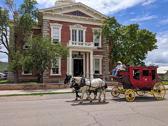 The historic courthouse, now a state park, watches over Tombstone like a red-brick sentinel, preserving stories of frontier justice.