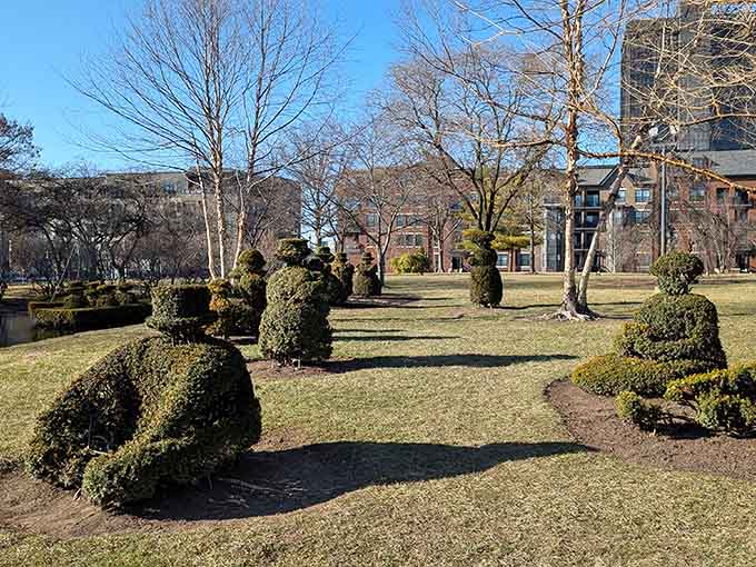These human-shaped topiaries recreate Seurat's famous figures with such dedication that you half expect them to start having a Sunday afternoon conversation.