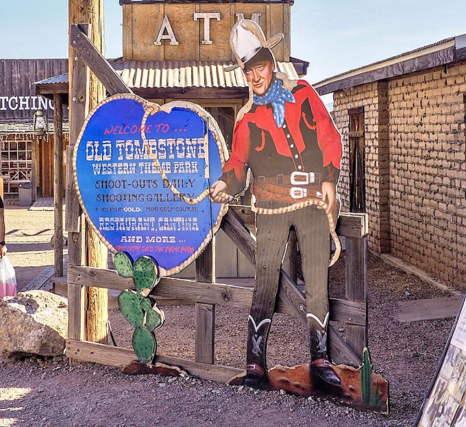 A cardboard cowboy stands eternal watch, never complaining about the heat or demanding bathroom breaks during his endless shift.