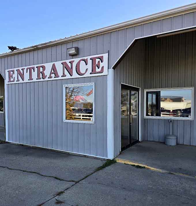 The clearly marked entrance welcomes visitors with the kind of straightforward hospitality that makes strangers feel like regulars from their very first visit.