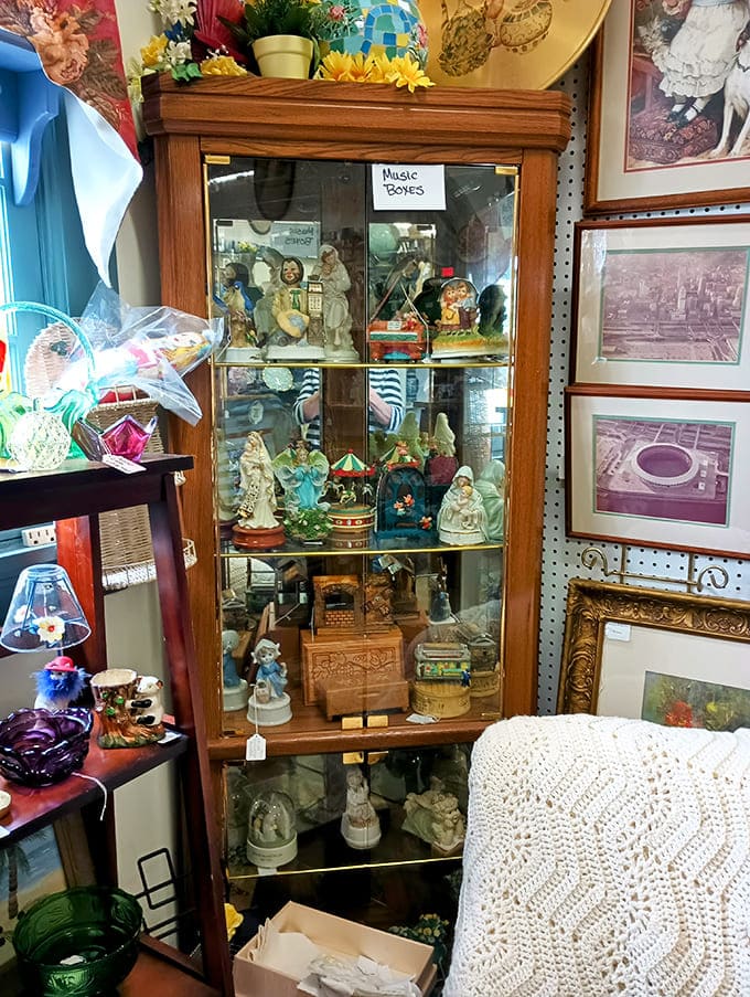 This elegant display case houses delicate music boxes and figurines, each one a tiny time machine waiting to transport its new owner to bygone days.