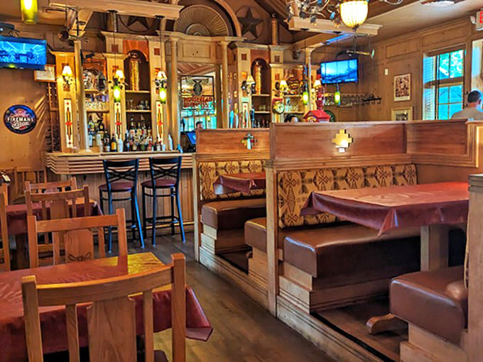 Comfort central! Wood paneling, booth seating, and just the right lighting create the perfect stage for memorable meals and even better company.