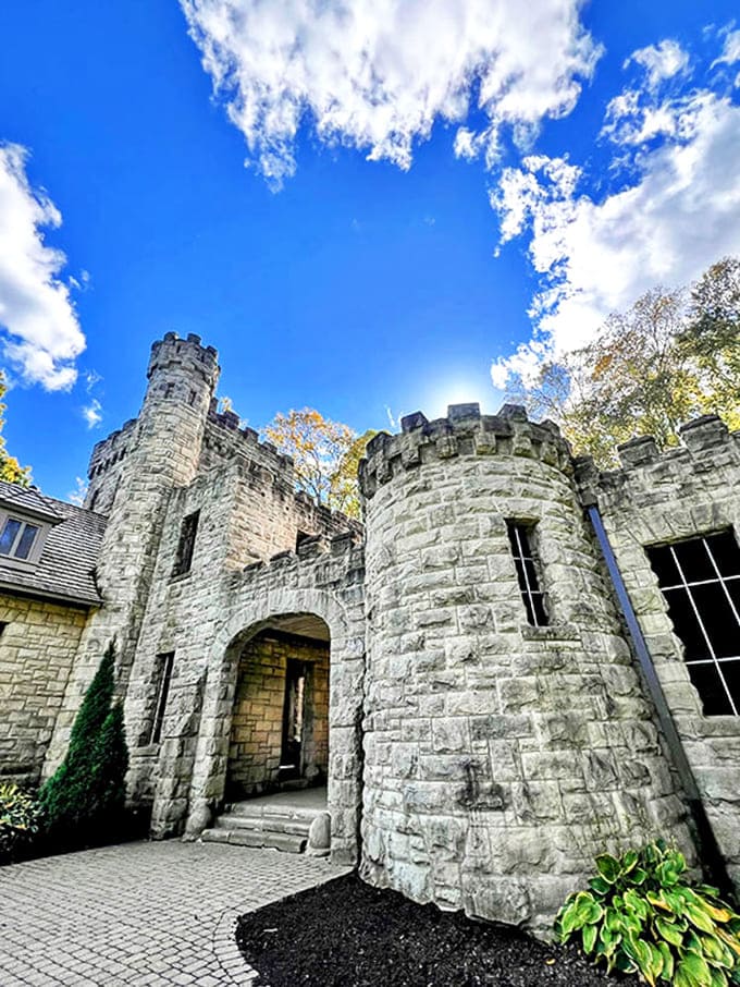 Stone towers reach skyward against brilliant blue, their medieval silhouettes creating a fairytale backdrop that seems transported from another continent.