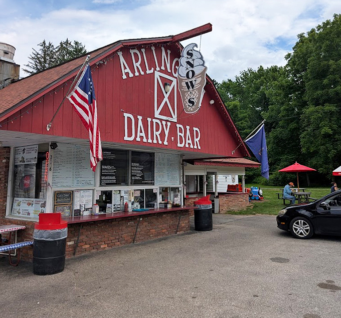 The welcoming facade that's launched a thousand cravings, with its American flag proudly waving and menu board promising delicious possibilities.