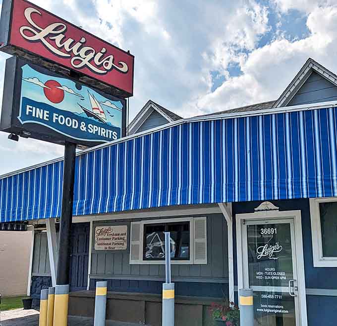 The blue awning and welcoming entrance of Luigi's stand ready to transport diners from everyday life to an authentic Italian dining experience.