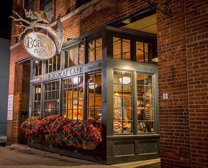 As evening approaches, The Bobcat's warm glow spills onto Bristol's sidewalks, inviting passersby to step in for an unforgettable meal.