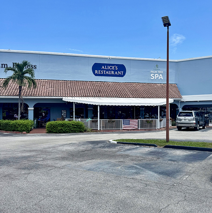 The iconic blue exterior of Alice's Restaurant stands as a beacon for hungry travelers and locals seeking breakfast perfection.