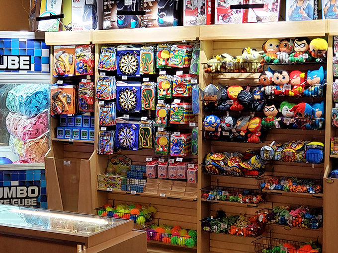 Treasure trove of temptations! The prize counter displays everything from small treats to impressive electronics, turning arcade tickets into tangible rewards.