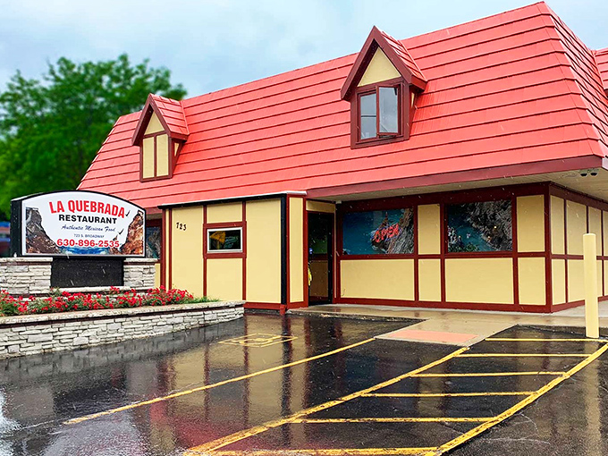 Even on rainy days, La Quebrada's cheerful exterior promises warm comfort and exceptional Mexican cuisine waiting just inside the door.