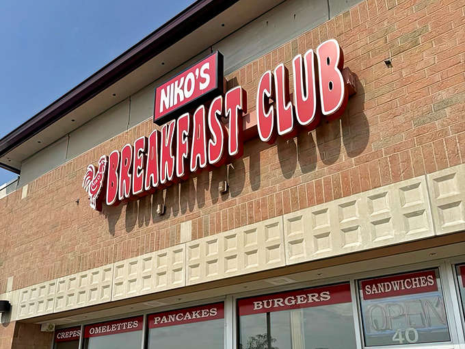 The weathered sign promises "Famous Fried Clams" but locals know it's the Boston Cream Pie that's the real hidden treasure.