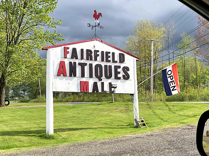 The iconic sign topped with its rooster weathervane promises treasures within &ndash; X marks the spot for antique adventurers.