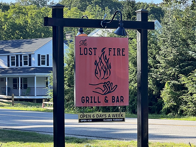 The restaurant's distinctive sign stands as a beacon for hungry travelers &ndash; a promise of extraordinary flavors waiting just beyond those doors.