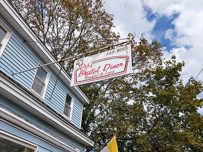 The sign that's guided hungry travelers to breakfast bliss for years, swaying gently in the Maine breeze.