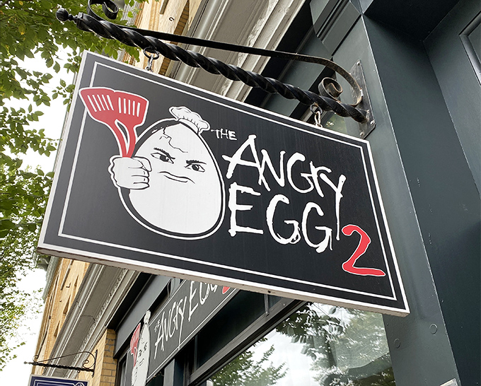 The signature angry egg logo glares down from the sign &ndash; a grumpy guardian of breakfast excellence that's become a beloved Bennington landmark.