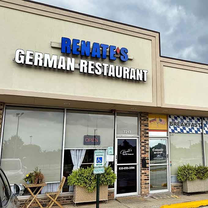 The bold blue lettering of Renate's sign serves as a beacon for hungry travelers seeking authentic German cuisine in suburban Chicago.