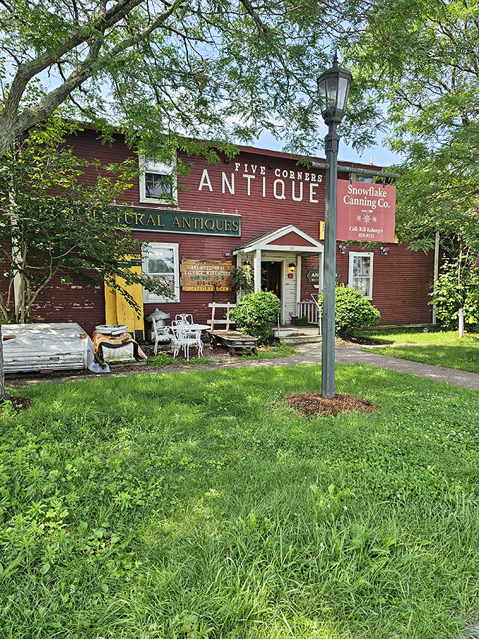 Five Corners Antiques stands proudly against Vermont's blue sky, its classic New England architecture housing centuries of American history.