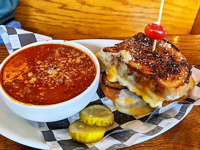 Comfort in a frame: that grilled cheese sandwich with its perfectly golden crust alongside tomato soup that tastes like childhood memories, only better.