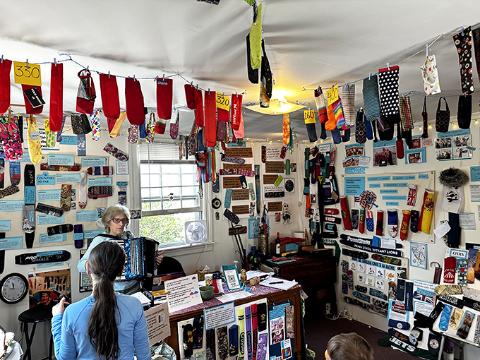 Every available inch of wall and ceiling space hosts colorful covers, creating an immersive experience in this one-of-a-kind collection.