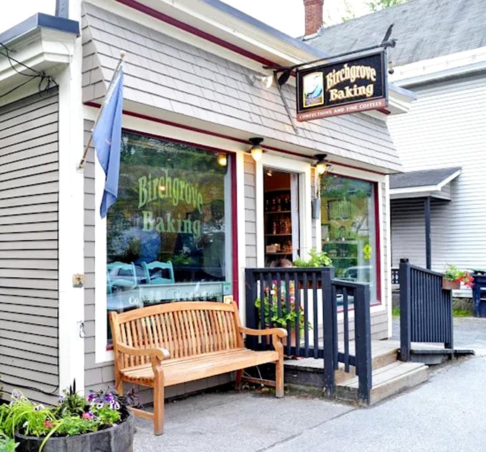 Birchgrove Baking's charming exterior invites you in with its wooden bench and welcoming vibe &ndash; Vermont's tastiest trap!