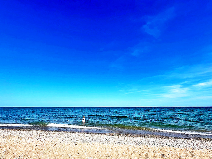 Nature's own infinity pool! Lake Michigan stretches to the horizon, inviting you for a refreshing dip.