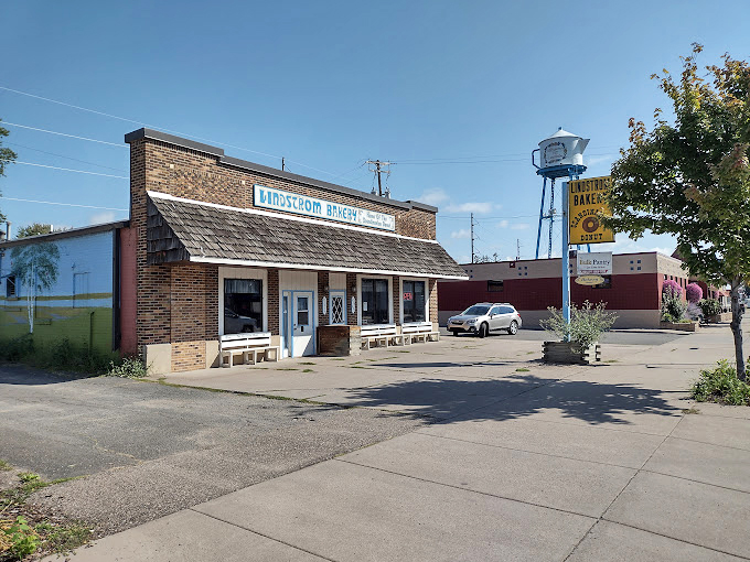 Step into a Swedish time machine! This charming brick bakery, complete with small-town water tower, promises Scandinavian treats that will make you say "Uff da!"