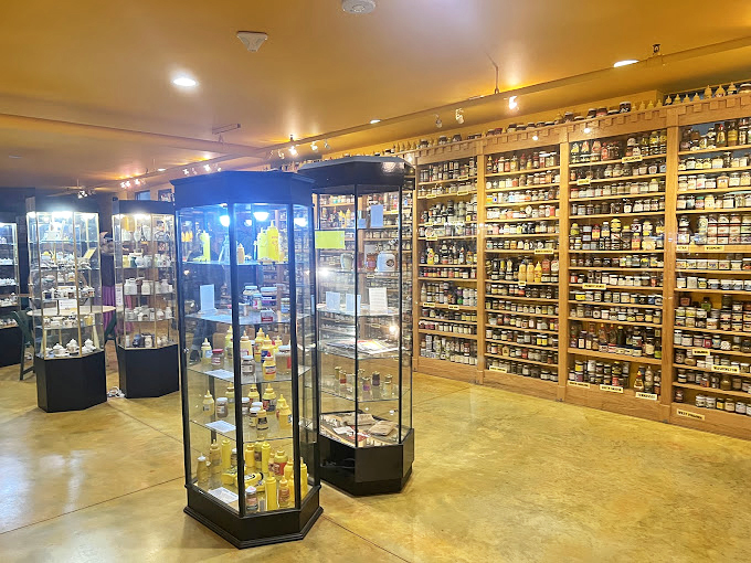 Shelves upon shelves of golden goodness await. It's a treasure trove that would make even Grey Poupon green with envy!