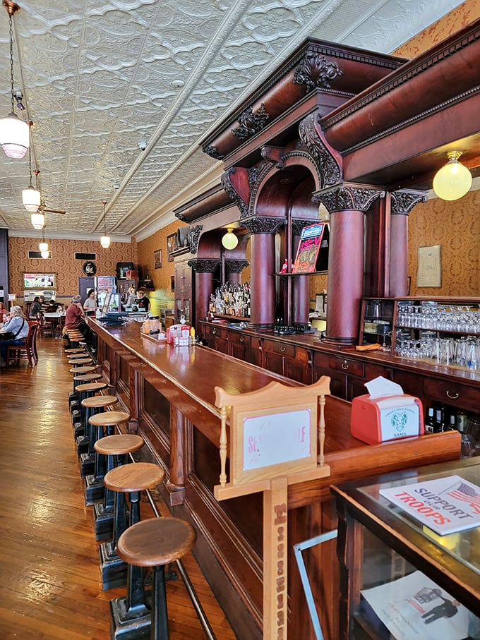 Step into a time machine! Kissner's brick facade whispers tales of bygone eras, while its ornate bay window winks at passersby, promising delicious secrets within.