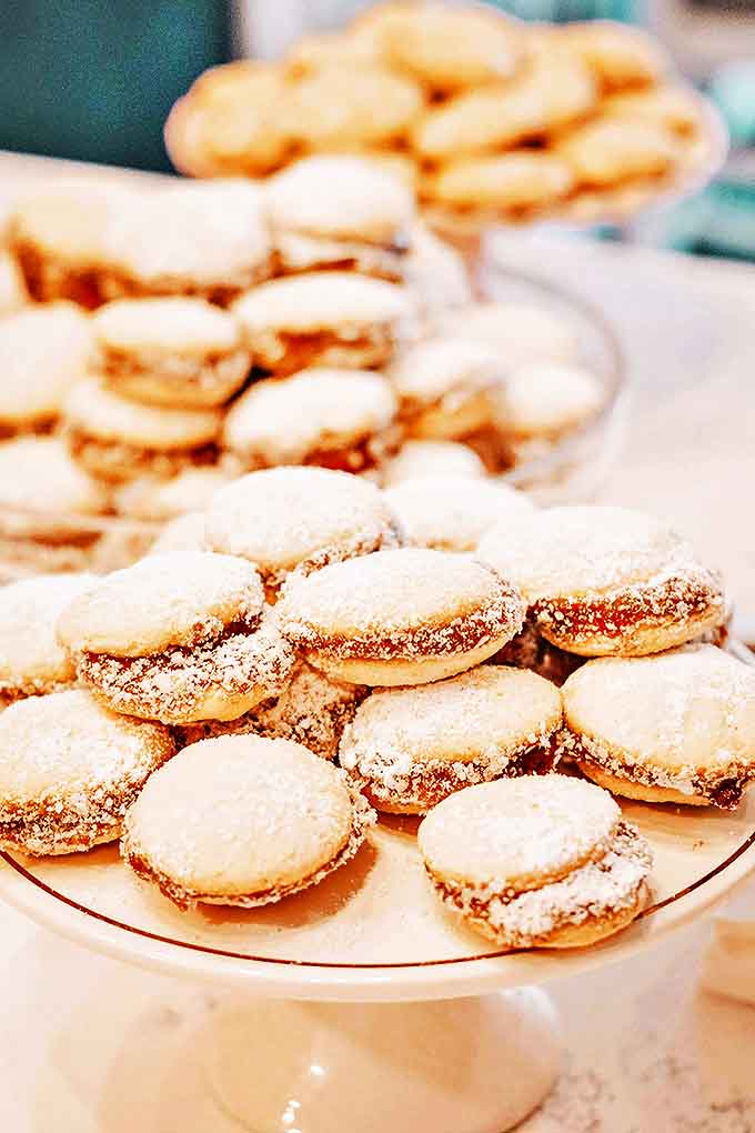 These delicate alfajores cookies are like little sandwiches of joy, dusted with powdered sugar and ready to melt in your mouth.