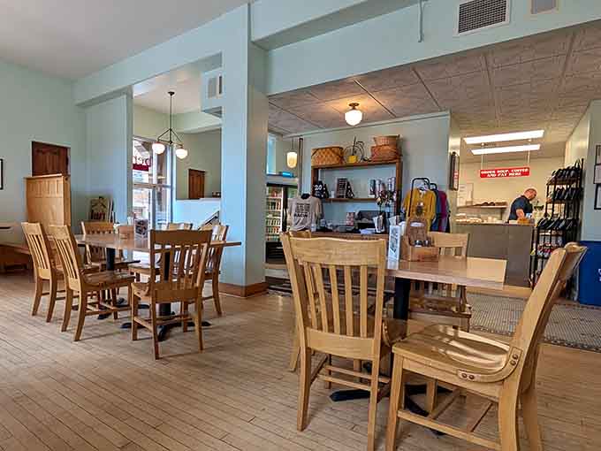 Wooden tables and natural light create the perfect backdrop for serious sandwich consumption and casual conversation alike.