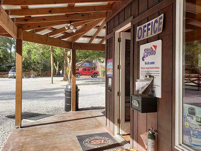 The welcoming office at Blue Grotto stands ready for adventure, a rustic gateway to underwater wonders awaiting beyond.
