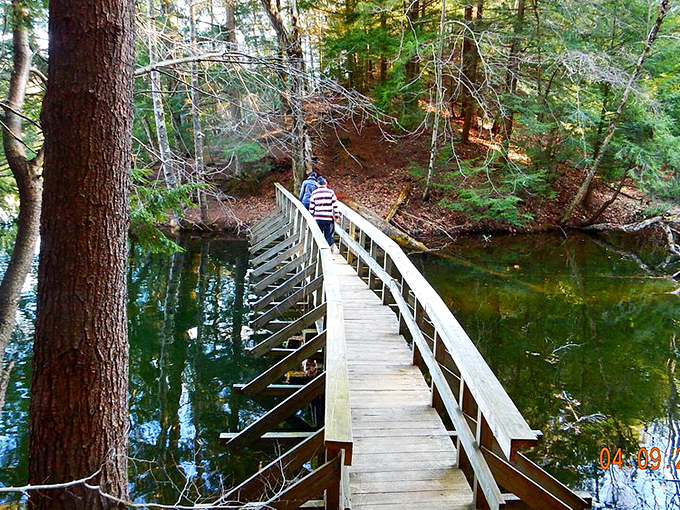 This winding wooden boardwalk feels like stepping into a fairytale, complete with mirror-like waters reflecting Vermont's natural beauty.